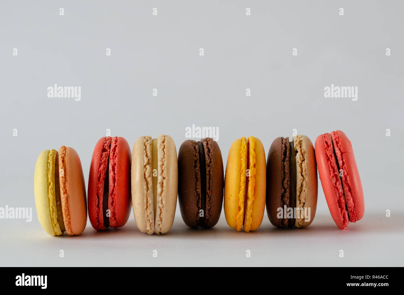 The cake on the white background is macaron or macaroon, soft pastel ...