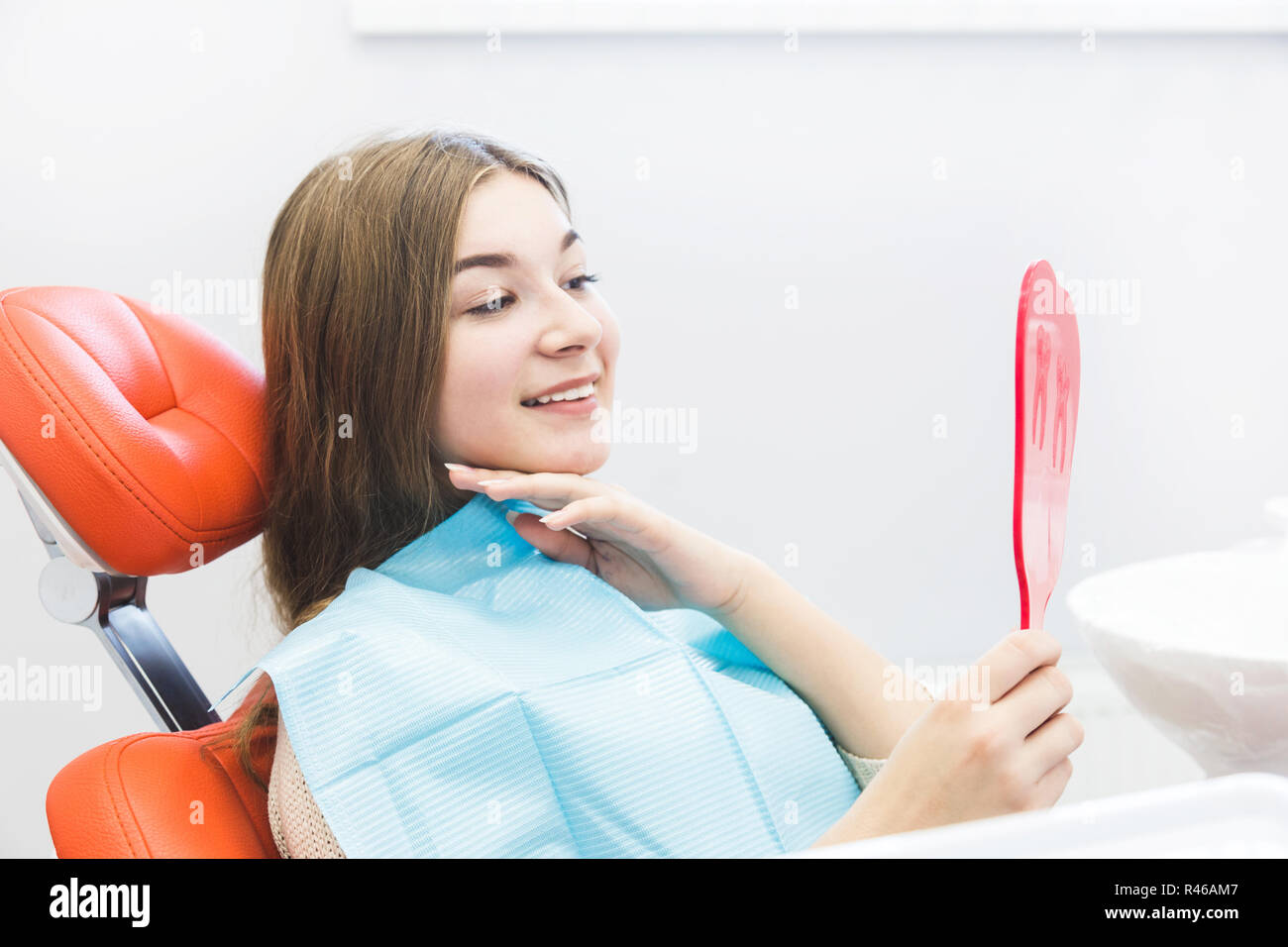 Dental clinic. Reception, examination of the patient. Teeth care. Young ...