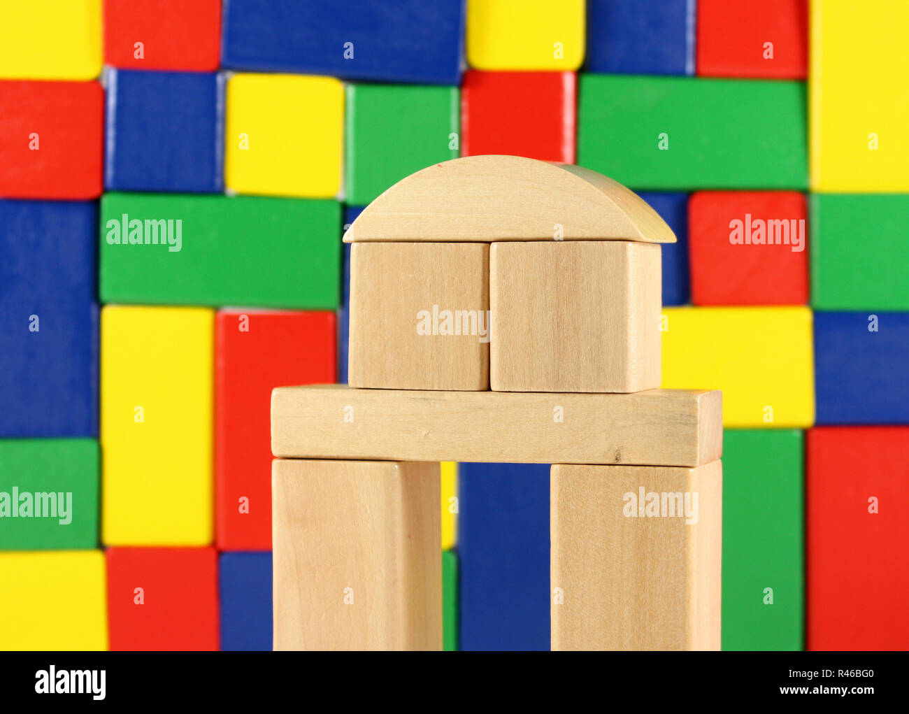 bright building blocks in front of colorful wall of building blocks ...