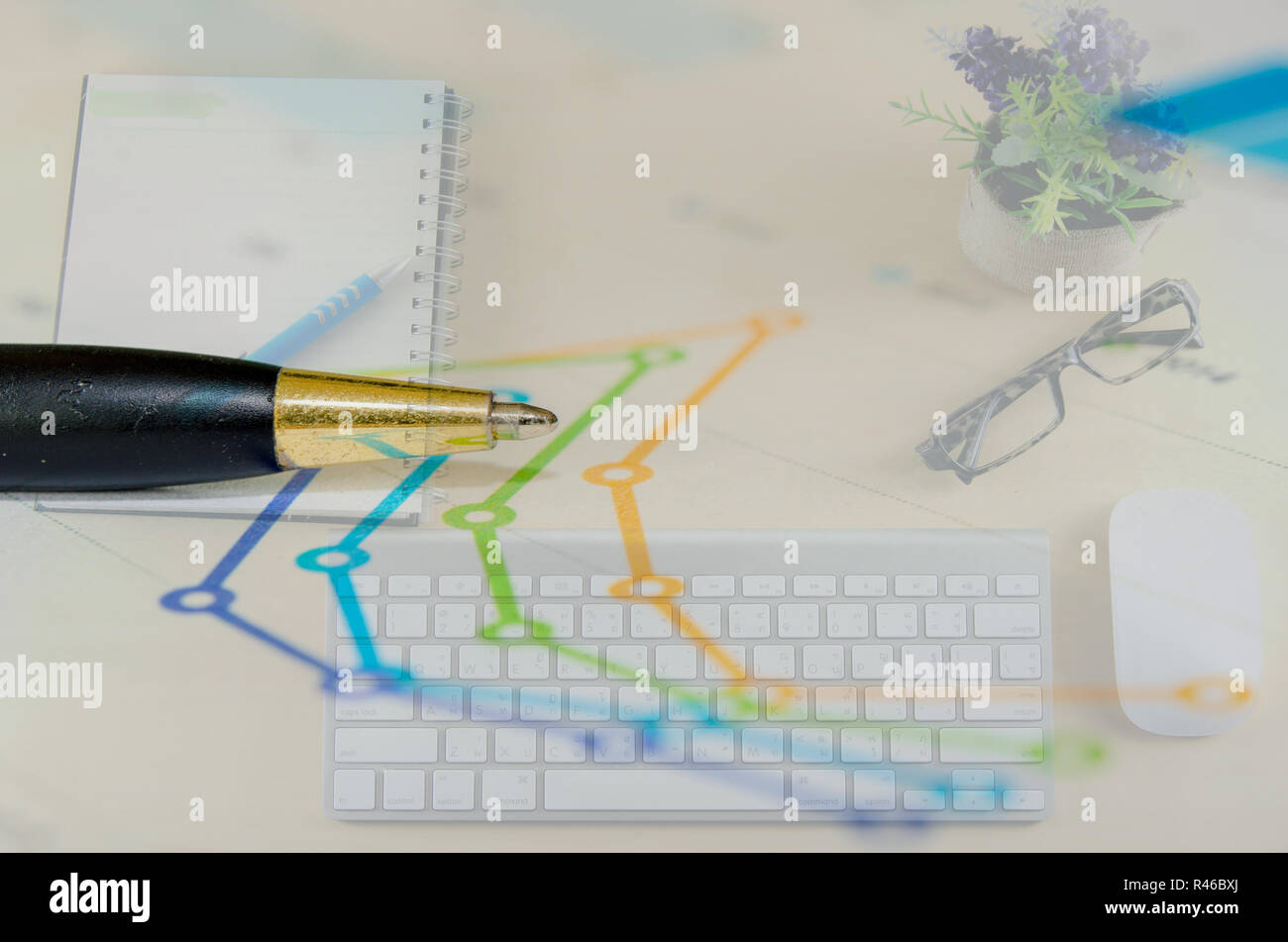 Graphs and pen Stock Photo - Alamy