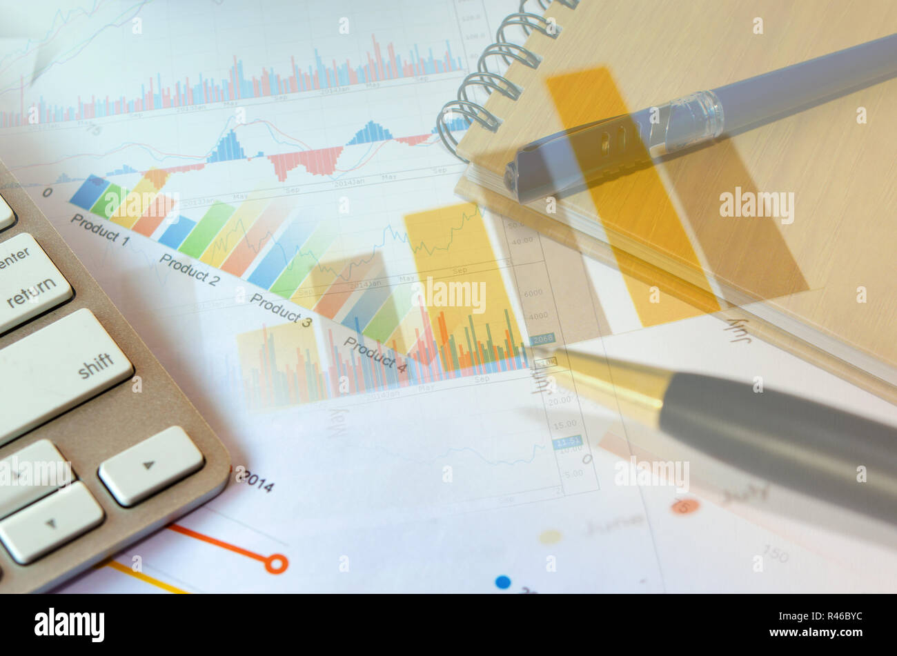 Graphs and pen Stock Photo - Alamy