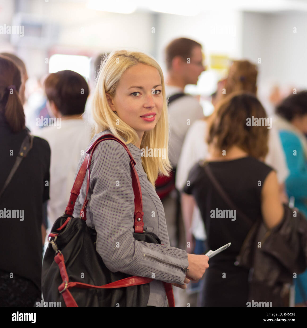 Crowd waiting in line passengers terminal hi-res stock photography and ...
