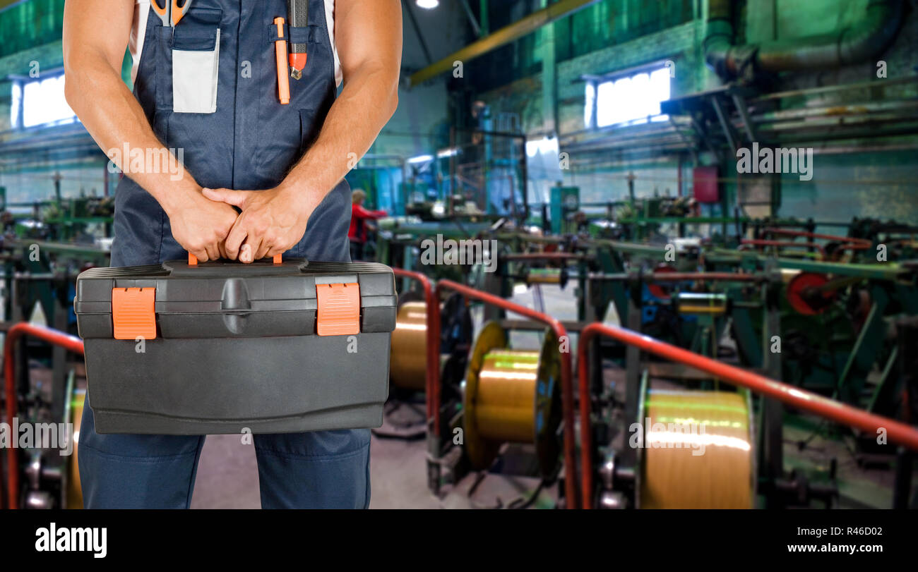 Worker with instruments Stock Photo - Alamy