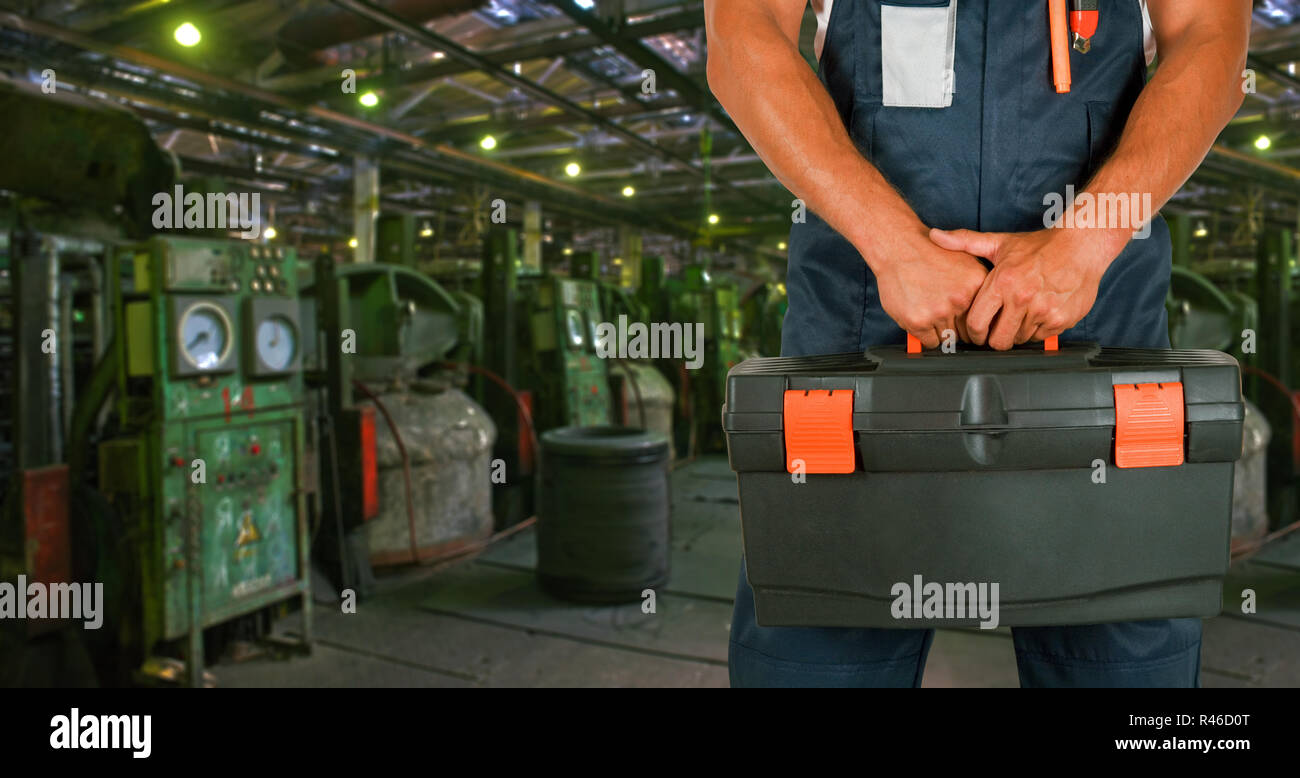 Worker with instruments Stock Photo - Alamy