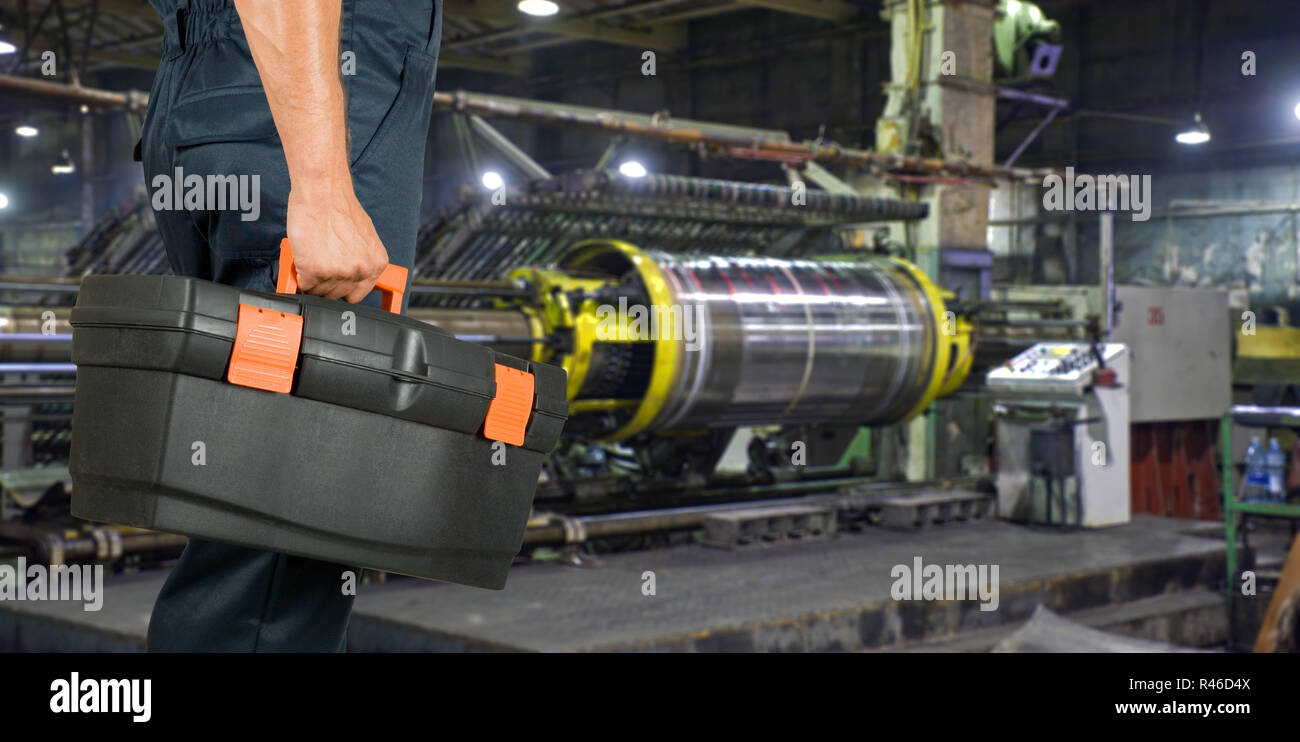 Worker with instruments Stock Photo - Alamy
