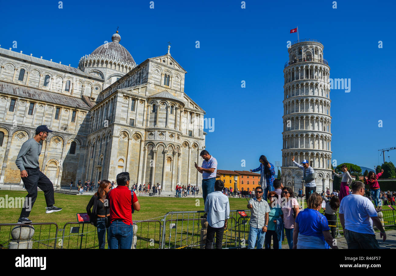 Pisa, Italy - Oct 18, 2018. People visit the Leaning Tower of Pisa. The ...
