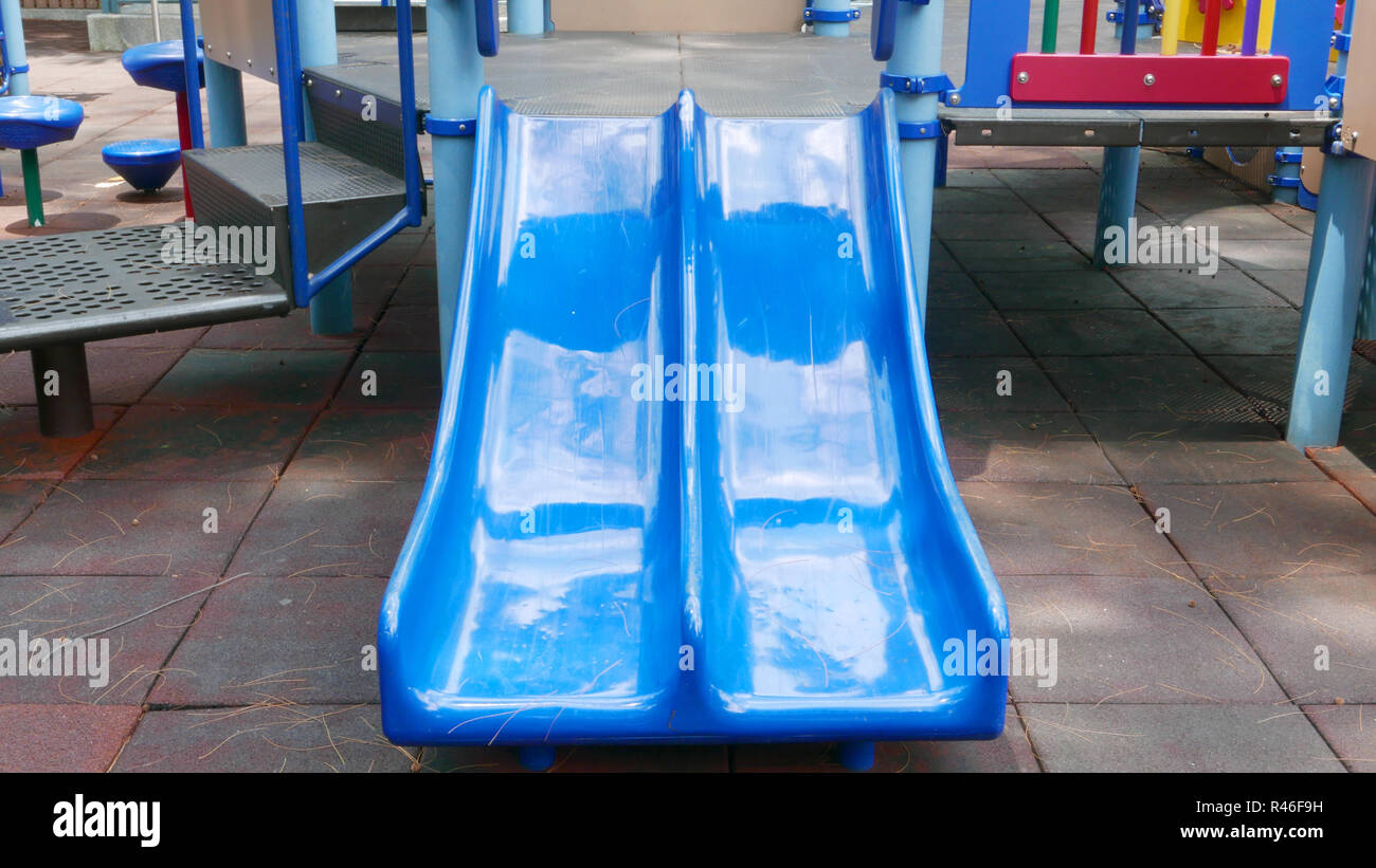 Colorful playground setup in sunny day Stock Photo - Alamy
