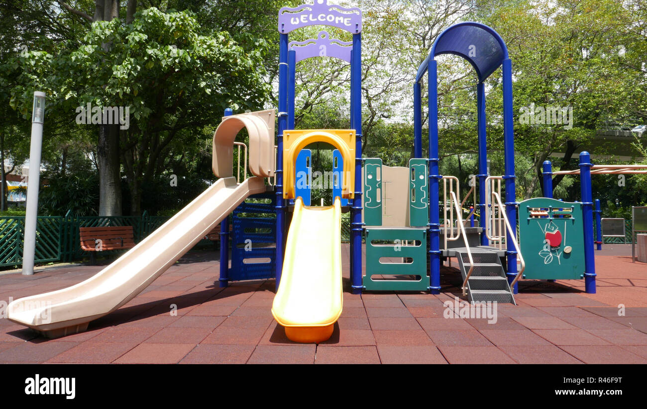 Colorful playground setup in sunny day Stock Photo - Alamy