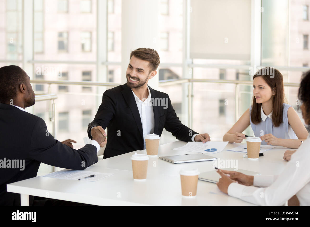 African business hand shake hi-res stock photography and images - Alamy