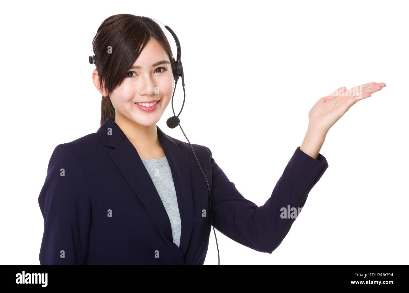 Customer services representative with open hand palm Stock Photo - Alamy