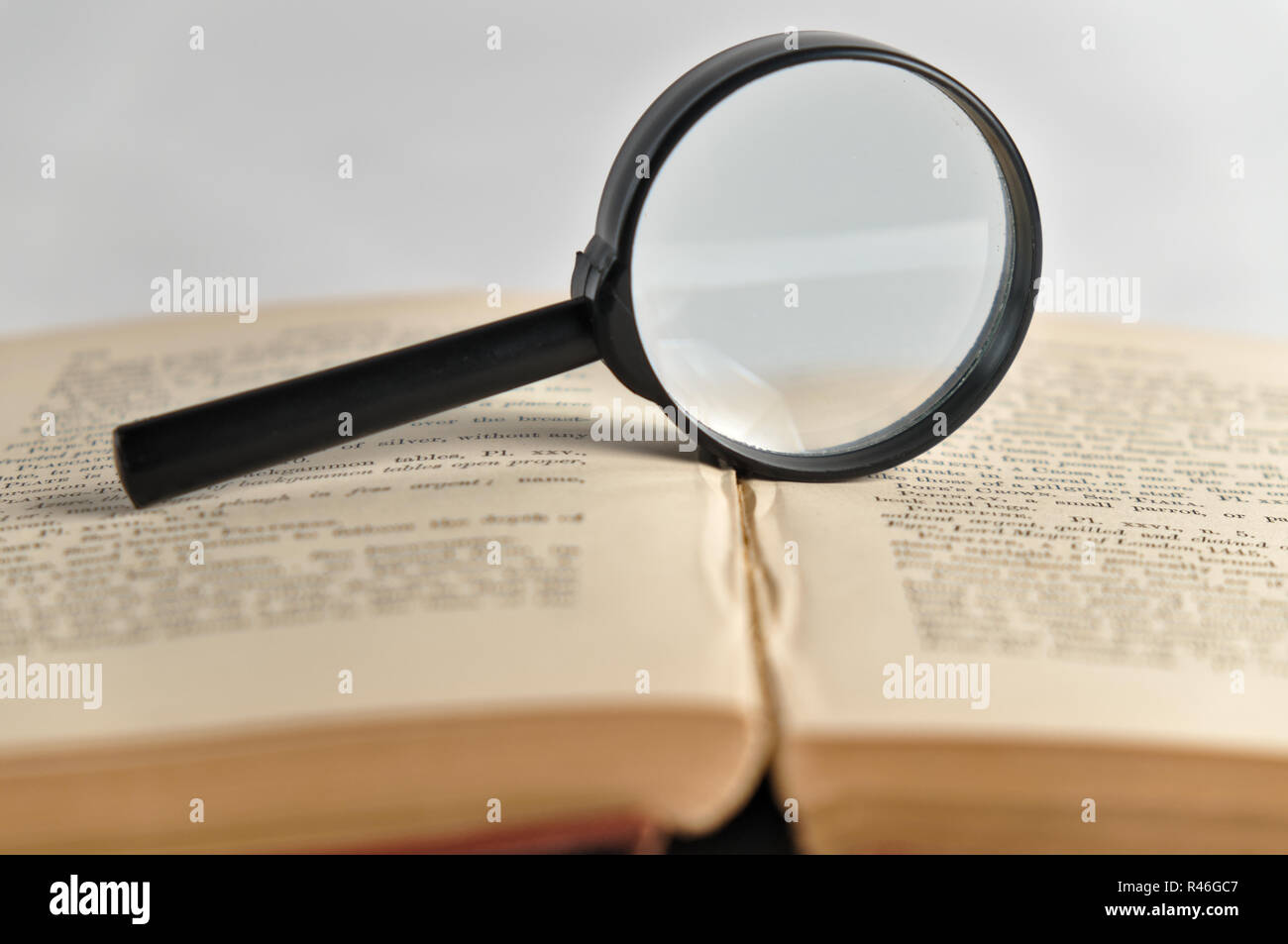Book magnifying glass concept education hi-res stock photography and ...