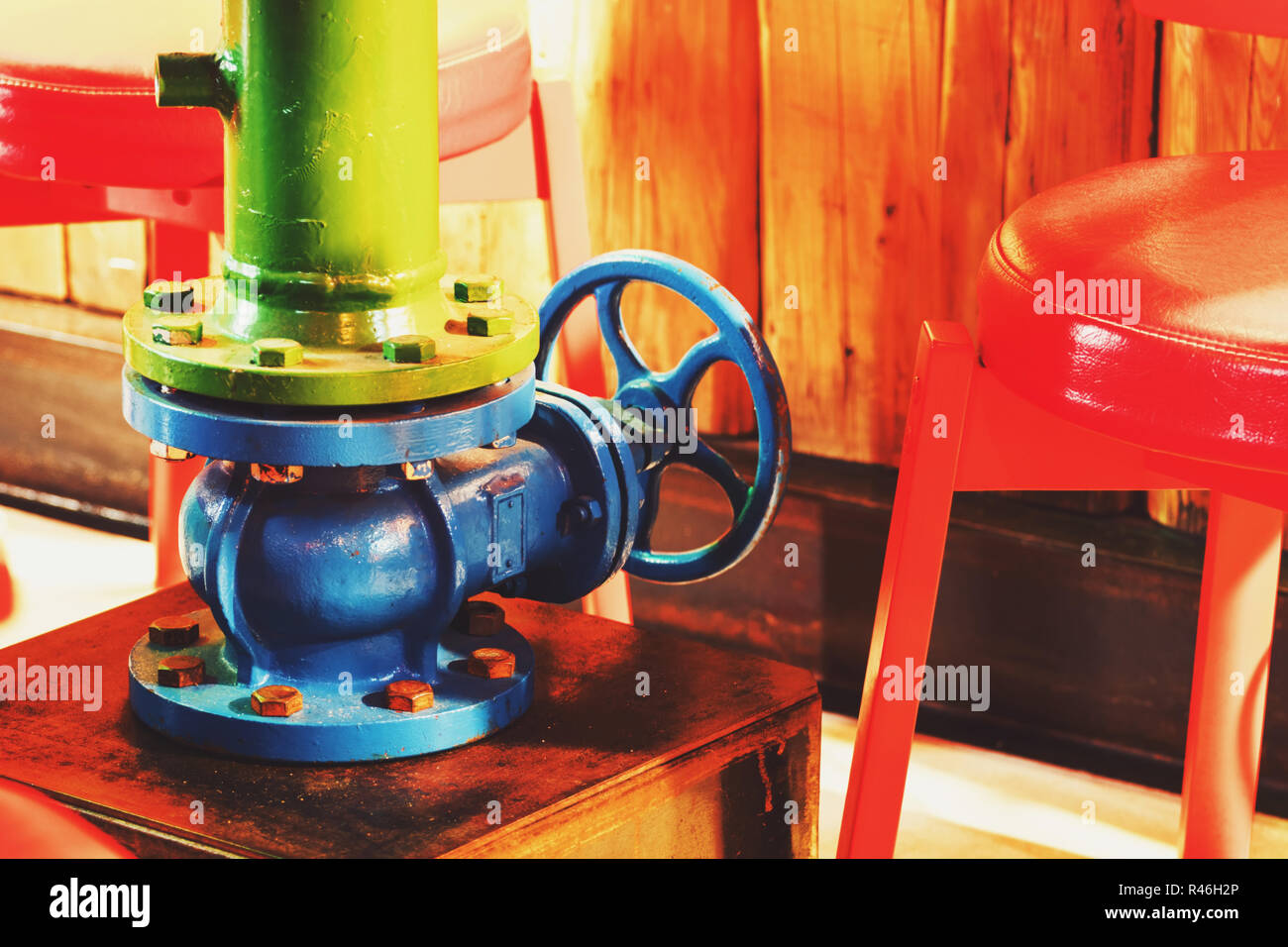 Industrial cafe table, Vintage valve table with chairs Stock Photo - Alamy