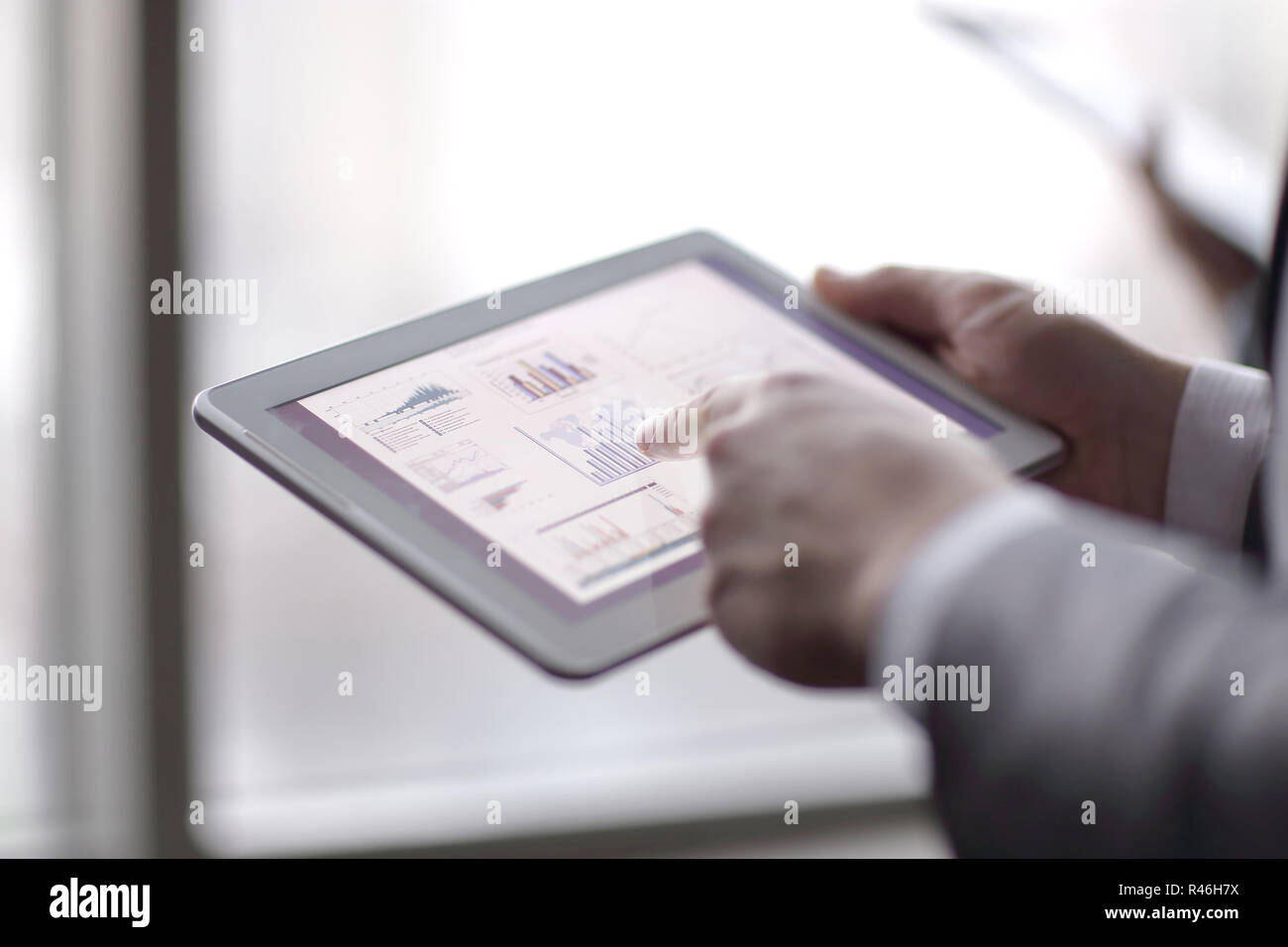 close up.businessman analyzing financial data using digital tab Stock ...