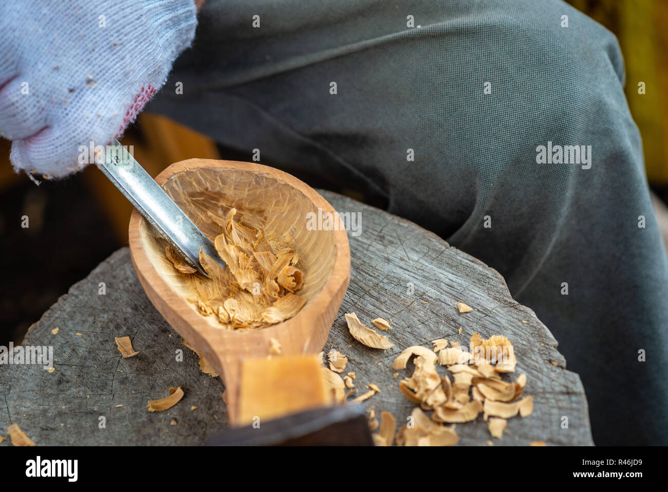 Craftsman demonstrates the process of making wooden spoons handmade ...