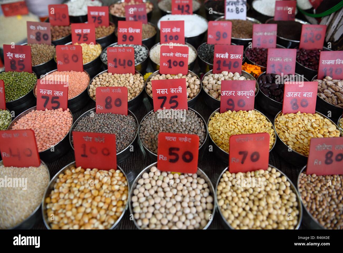 Rows of fresh traditional Indian Dals, (legumes, lentils, beans) in the ...