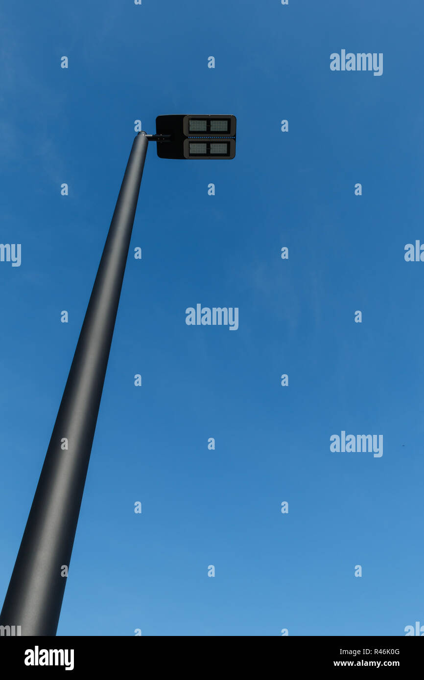 Modern lamp post against a blue sky hi-res stock photography and images ...