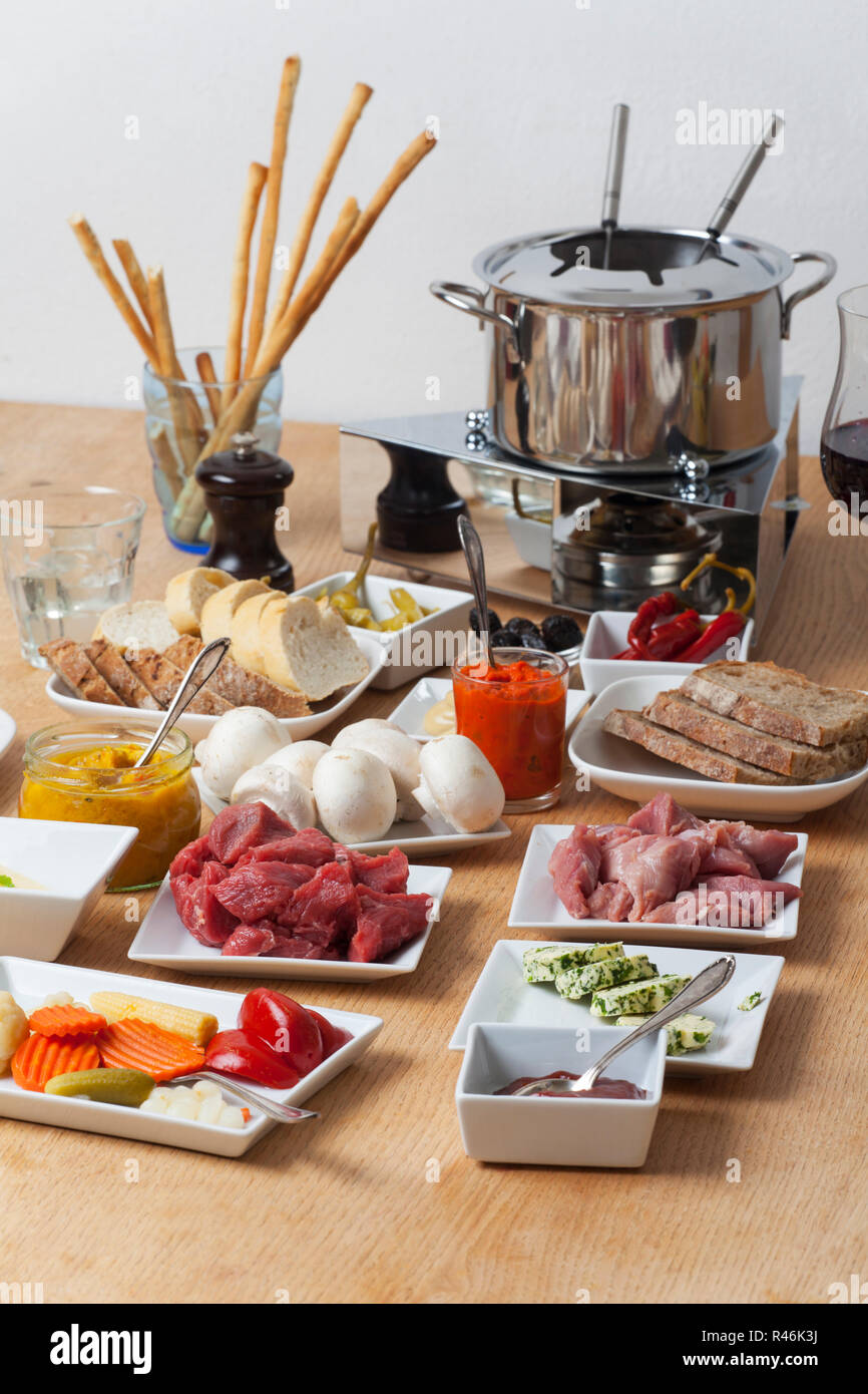 closeup of a fondue set Stock Photo - Alamy