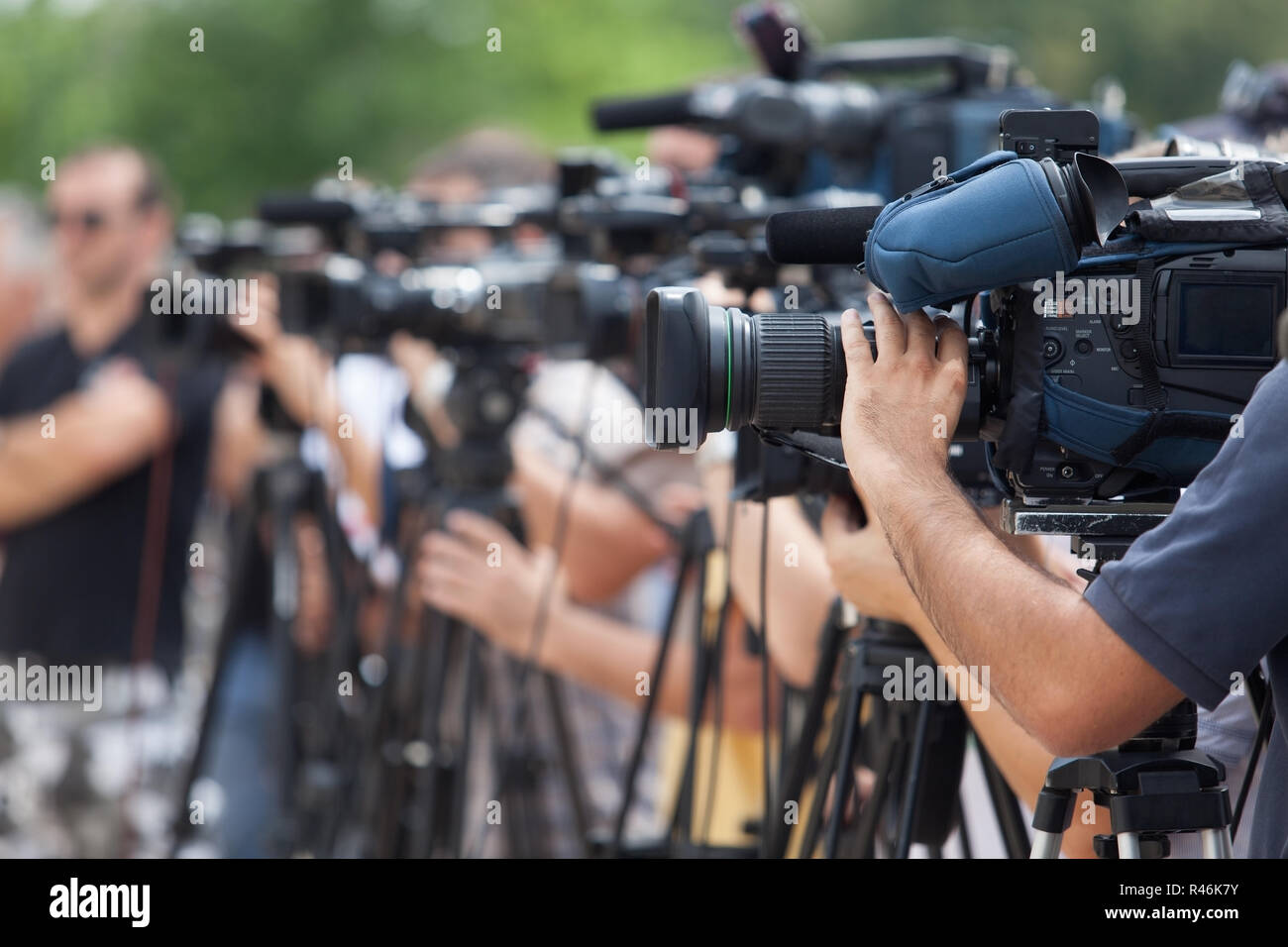 News conference. Filming an event with a video camera Stock Photo - Alamy