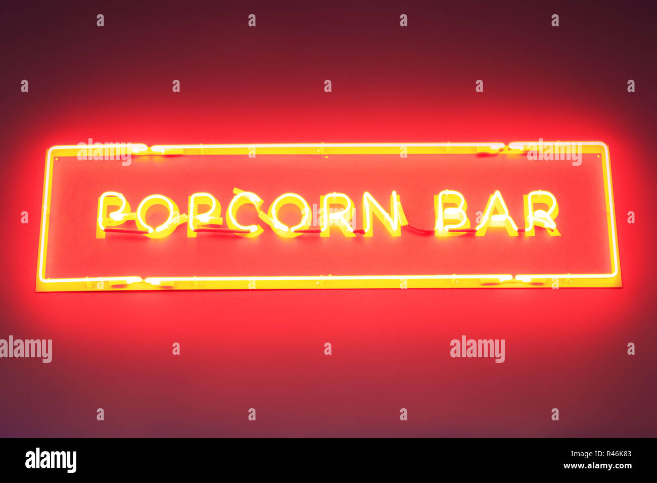 plate popcorn made from red neon lights Stock Photo - Alamy