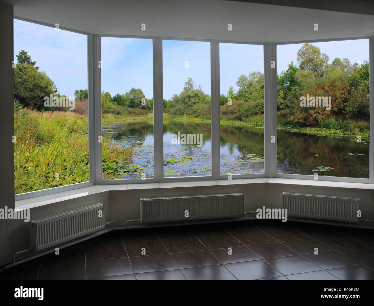 window overlooking the summer pond Stock Photo - Alamy