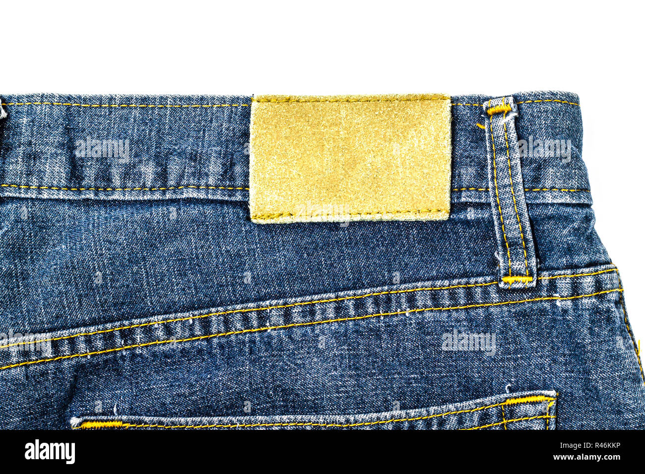 Leather jeans label sewed on jeans Stock Photo - Alamy