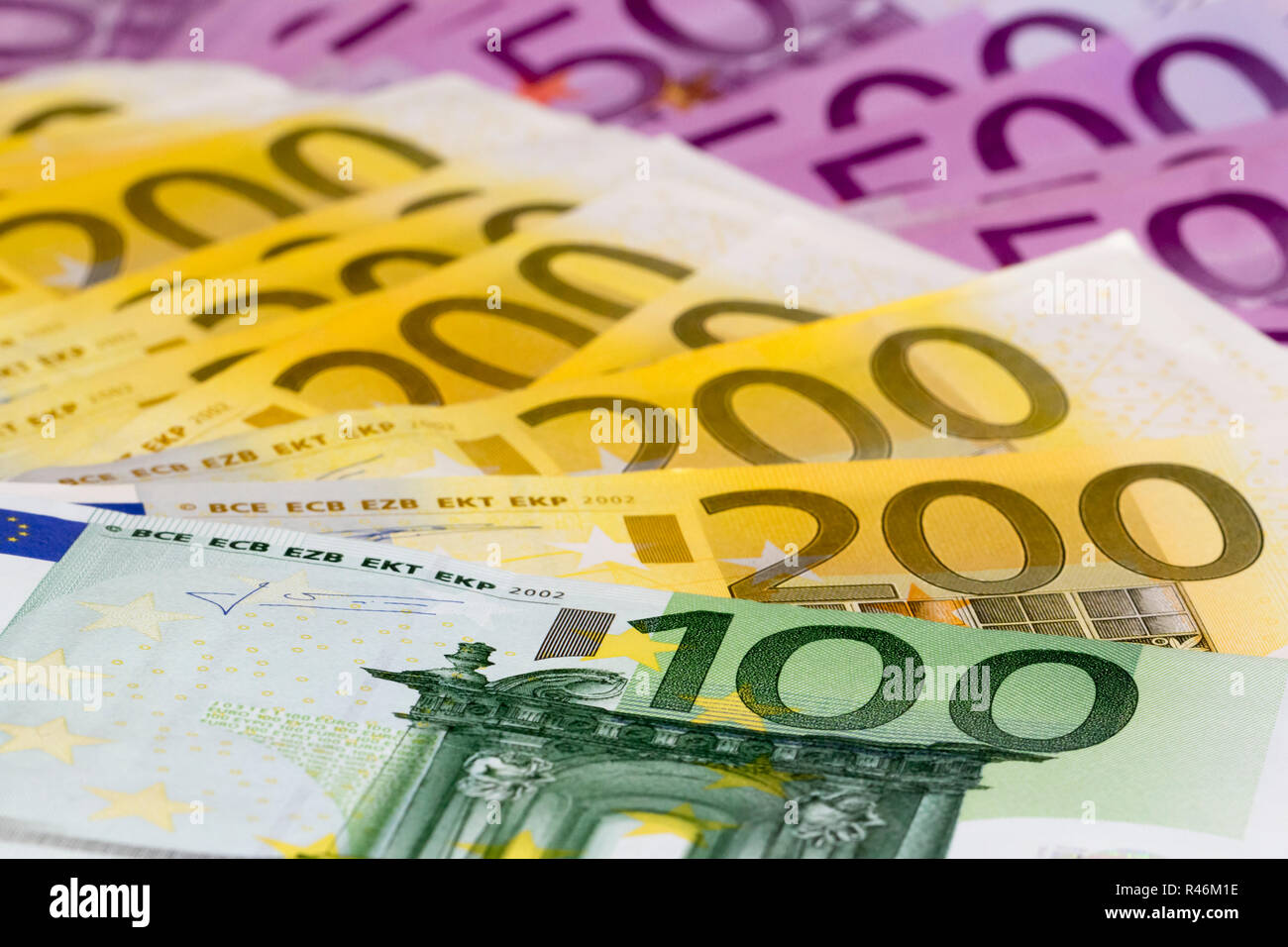 Macro stack of money with 100 200 and 500 euro banknotes Stock Photo ...