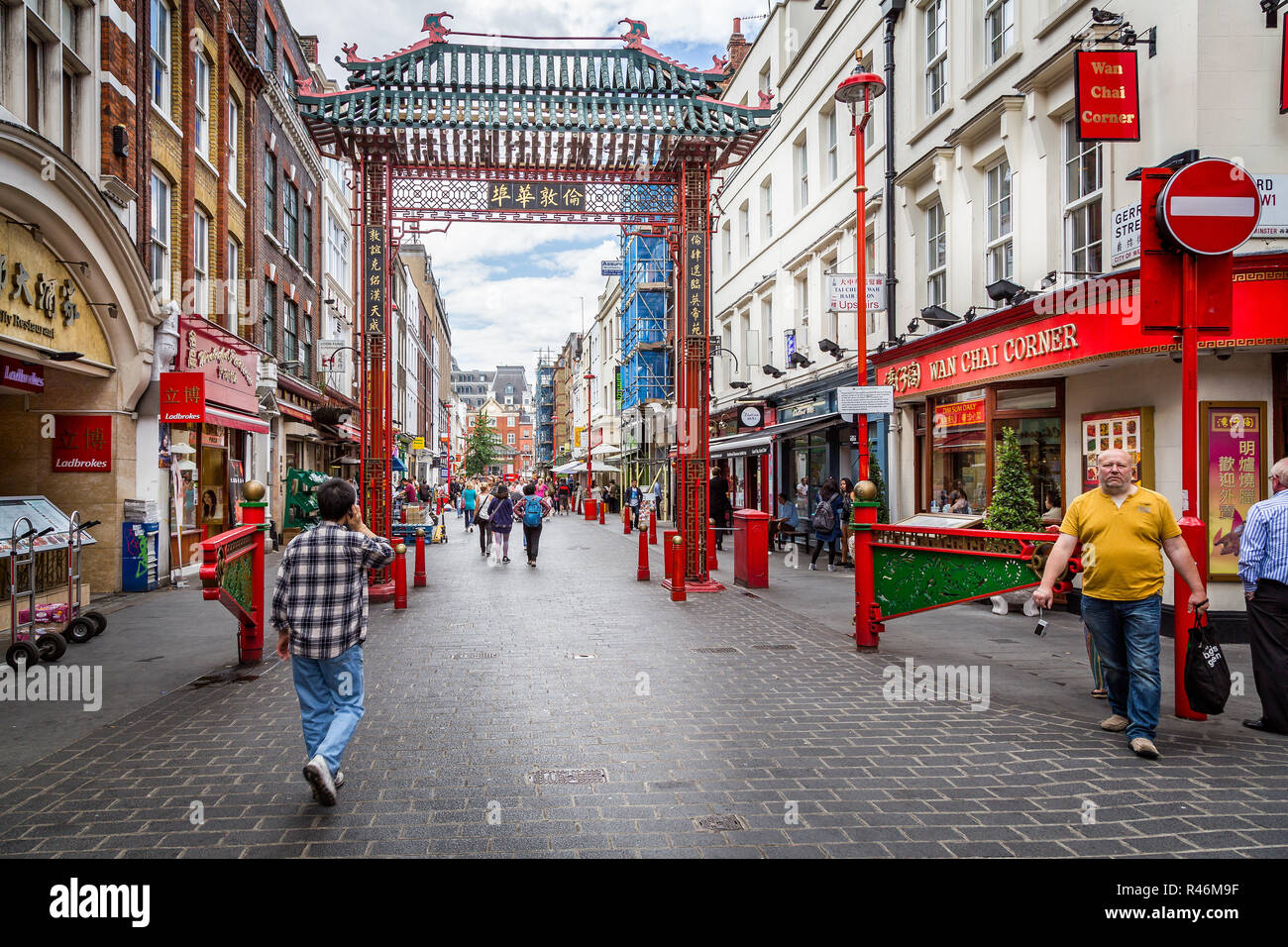 Chinatown Gate and restaurants in Gerrard Street, London, UK on 12 ...