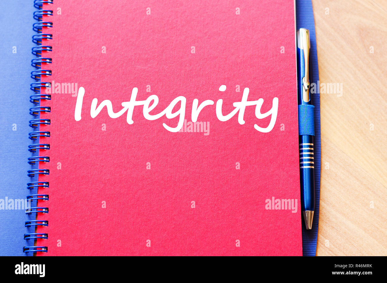 Integrity write on notebook Stock Photo - Alamy