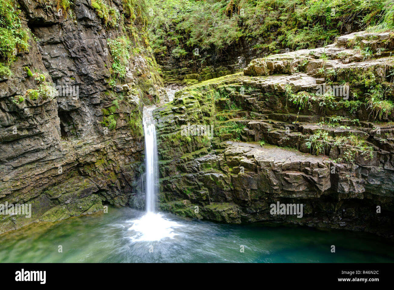 waterfall in a lagoon Stock Photo - Alamy