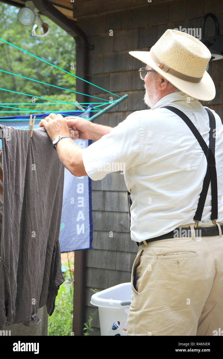 Washing clothes line elderly hi-res stock photography and images - Alamy