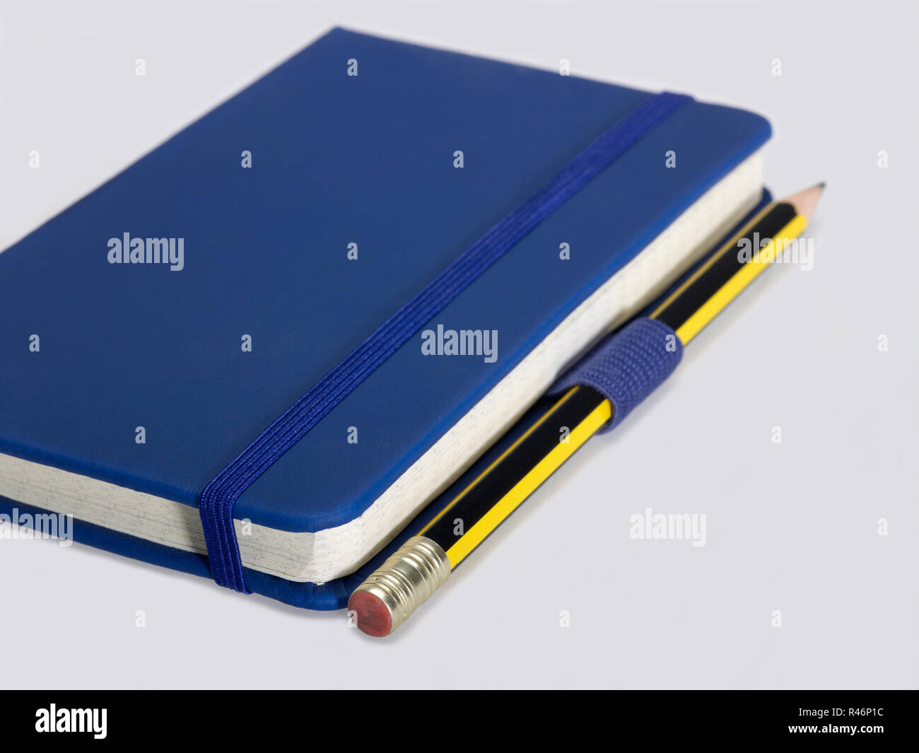 blue notebook and pencil Stock Photo - Alamy