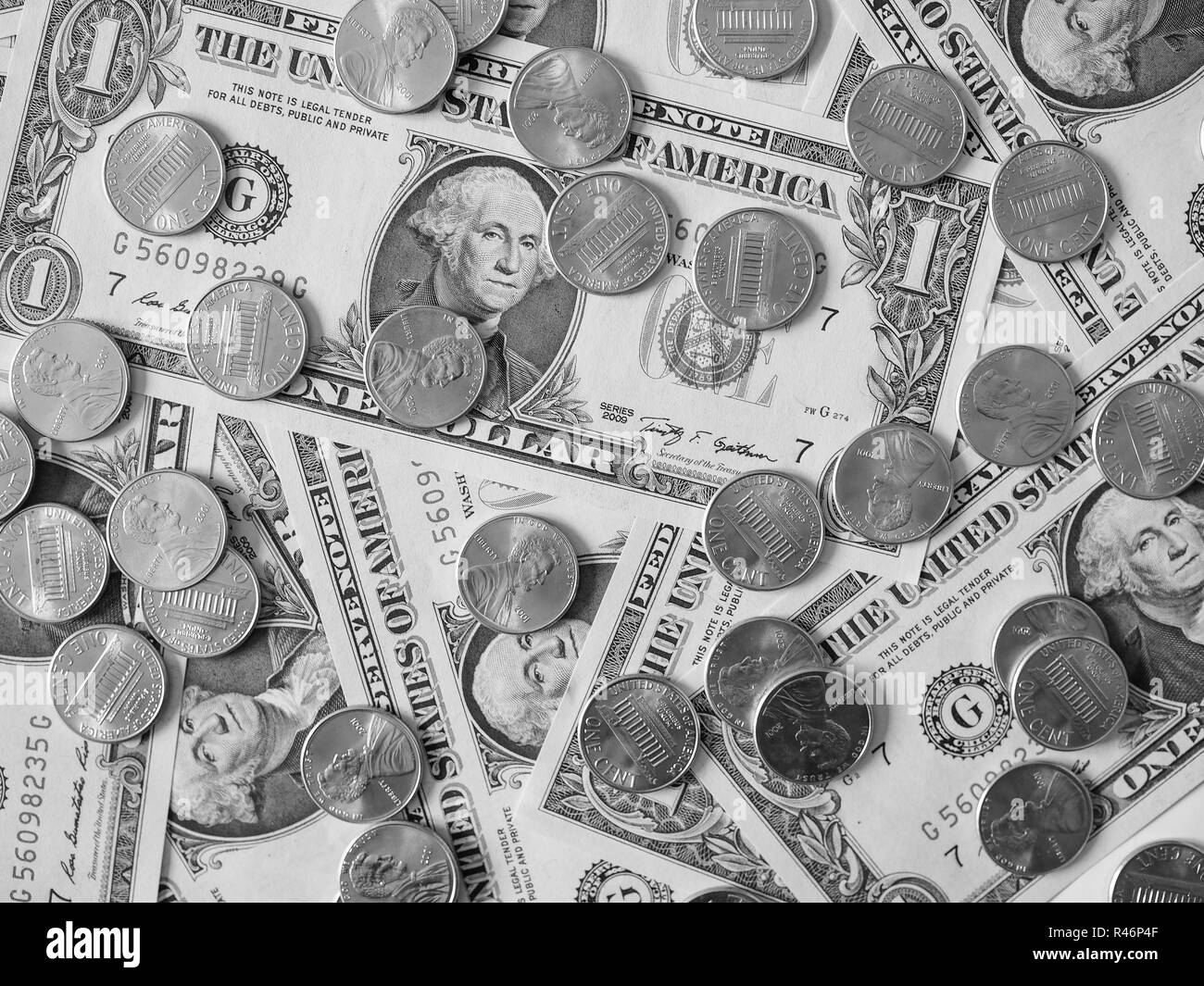 Black and white Dollar coins and notes Stock Photo - Alamy