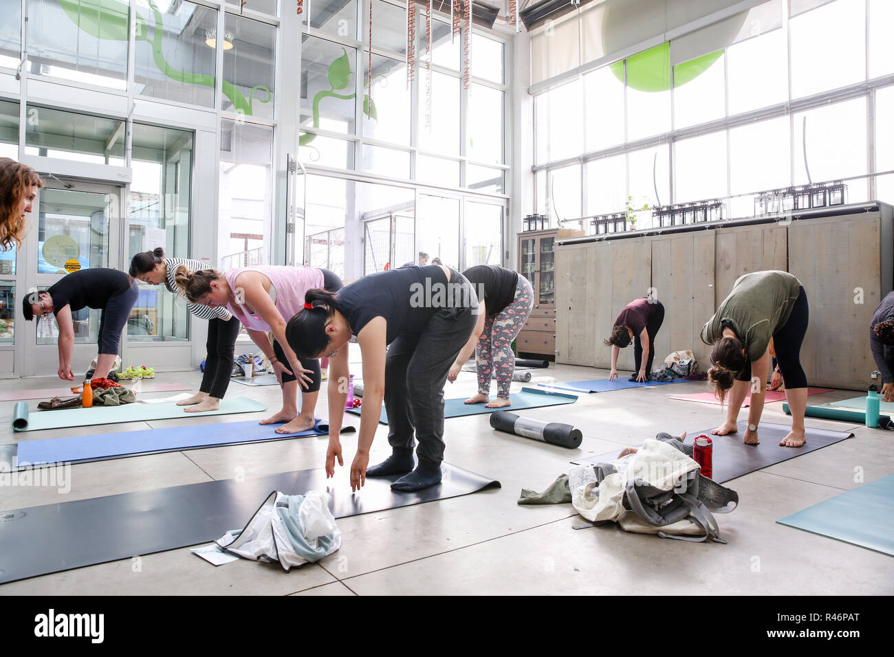 TORONTO, ONTARIO, CANADA - MAY 27, 2018: PEOPLE DO YOGA AT PARENTING ...