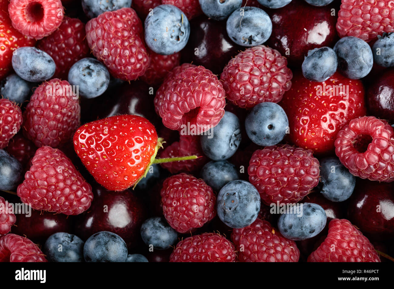 Berries closeup colorful assorted mix of strawberry, blueberry ...