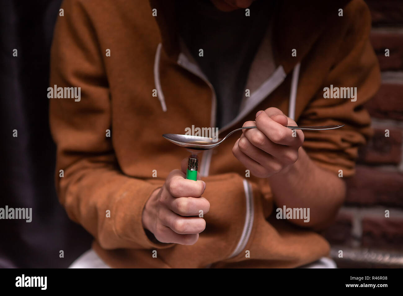 An addict makes a drug. Stop the drugs. Dangerous habit. Close-up Stock ...