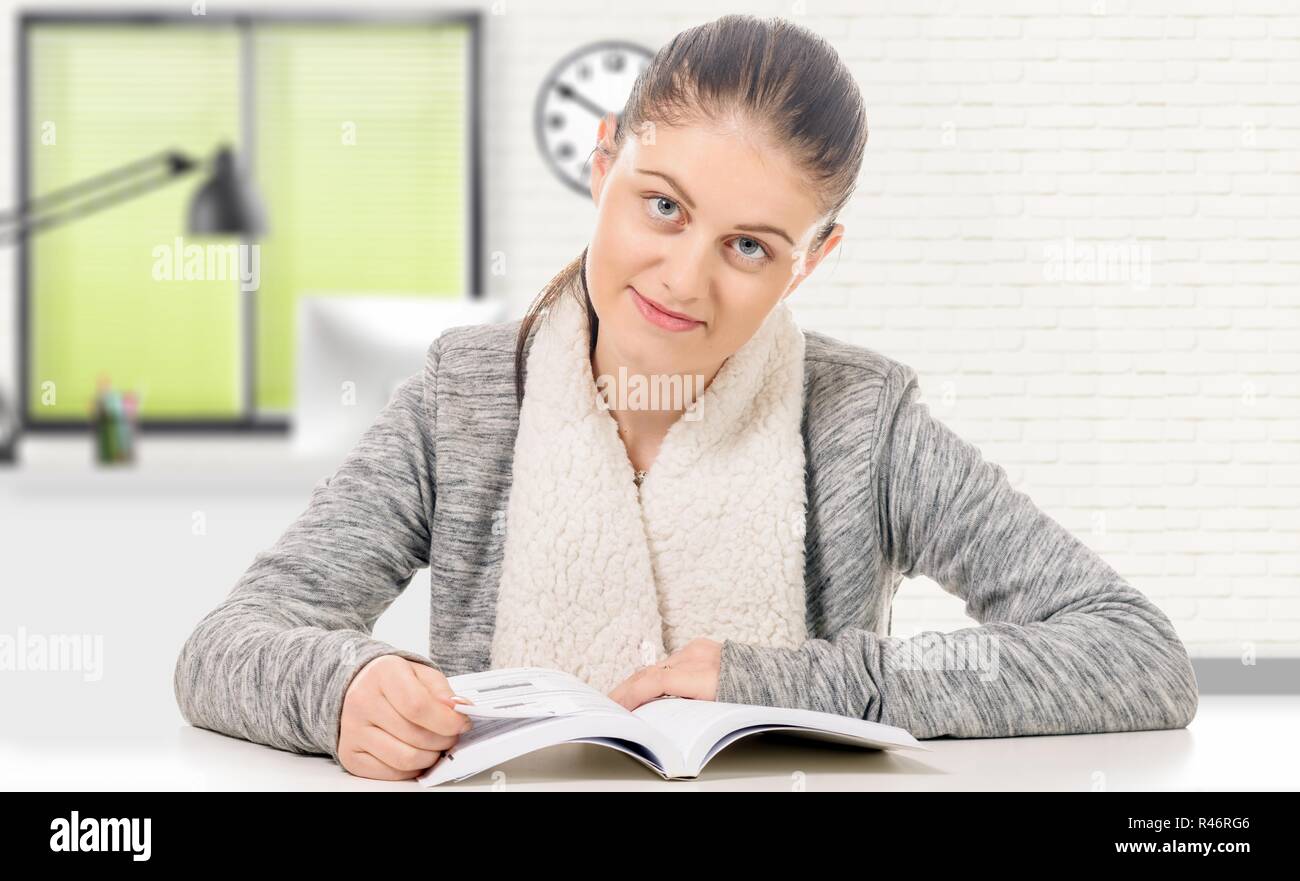 beautiful girl reading a book on white background Stock Photo - Alamy