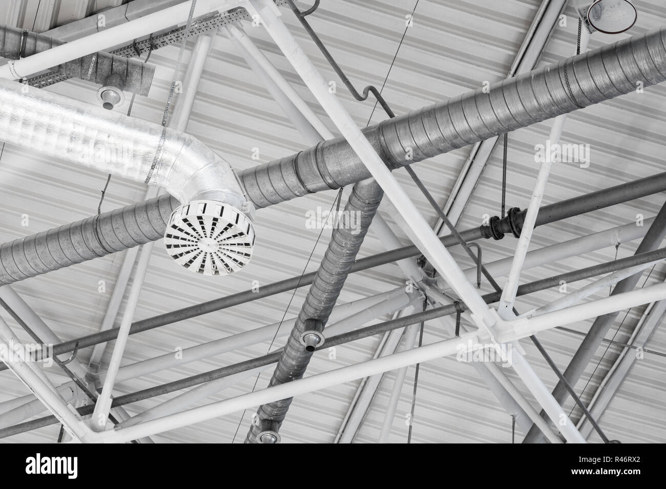 a system of ventilation pipes under stadium ceiling Stock Photo - Alamy