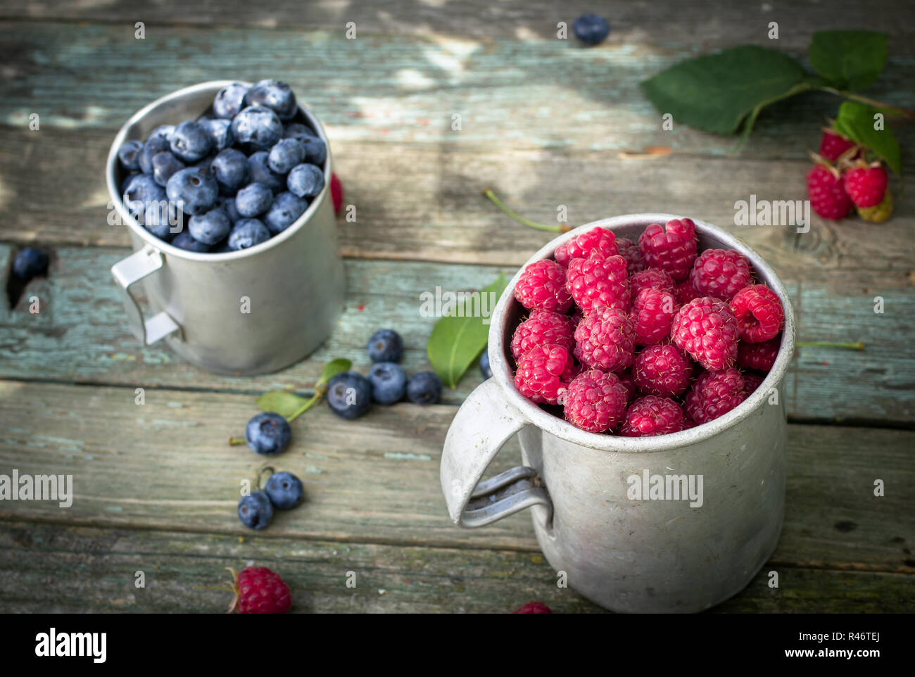Mugs of raspberry and blueberry Stock Photo - Alamy