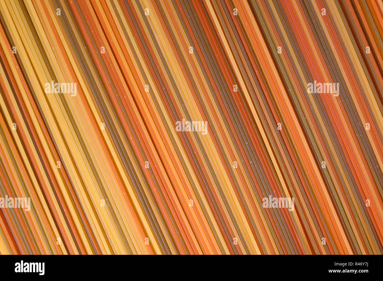 Colorful tricolore spaghetti pasta background Stock Photo - Alamy