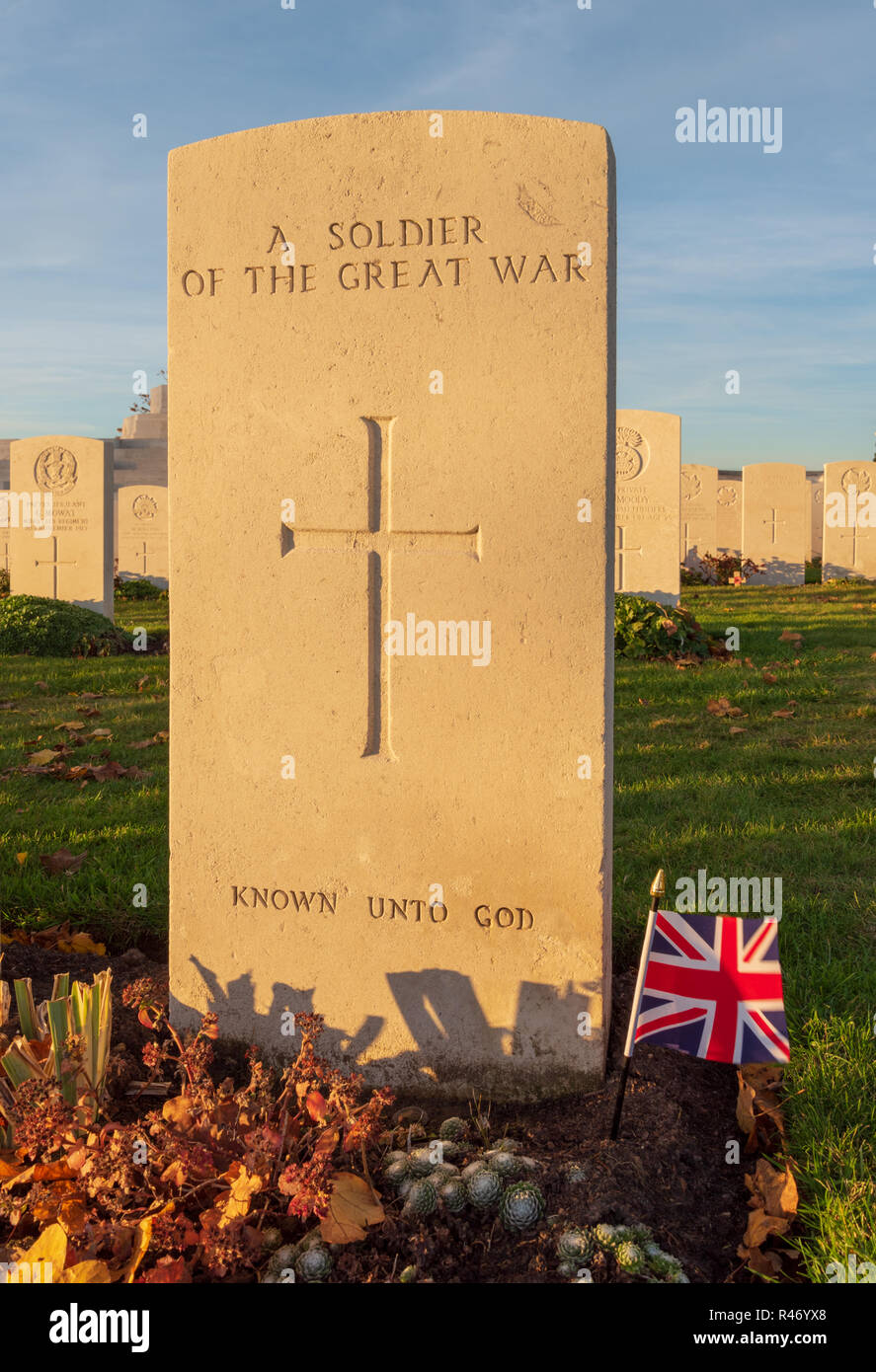 Headstone of unknown soldier in Tyne Cot British military cemetery near ...