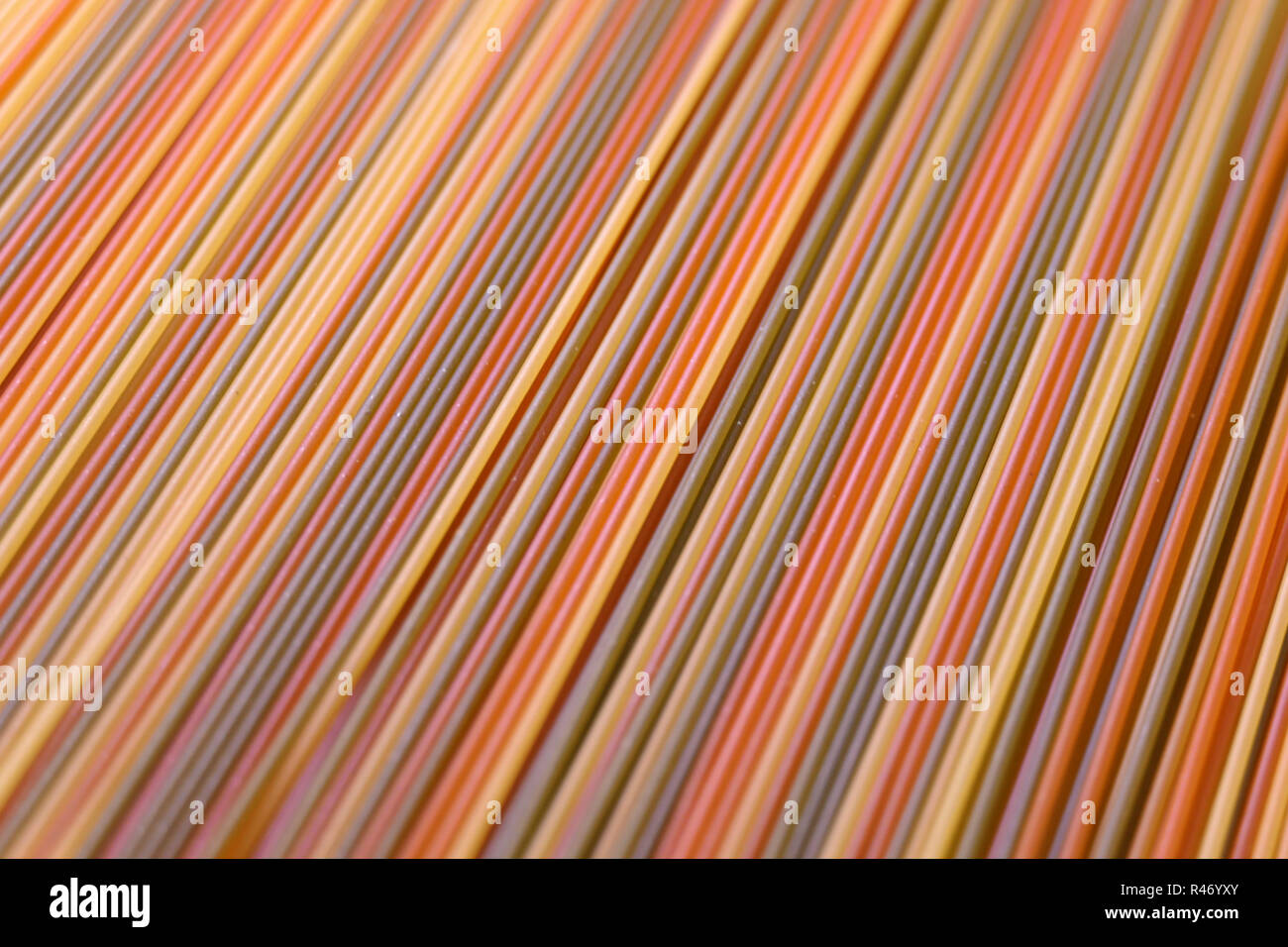 Colorful tricolore spaghetti pasta background Stock Photo - Alamy