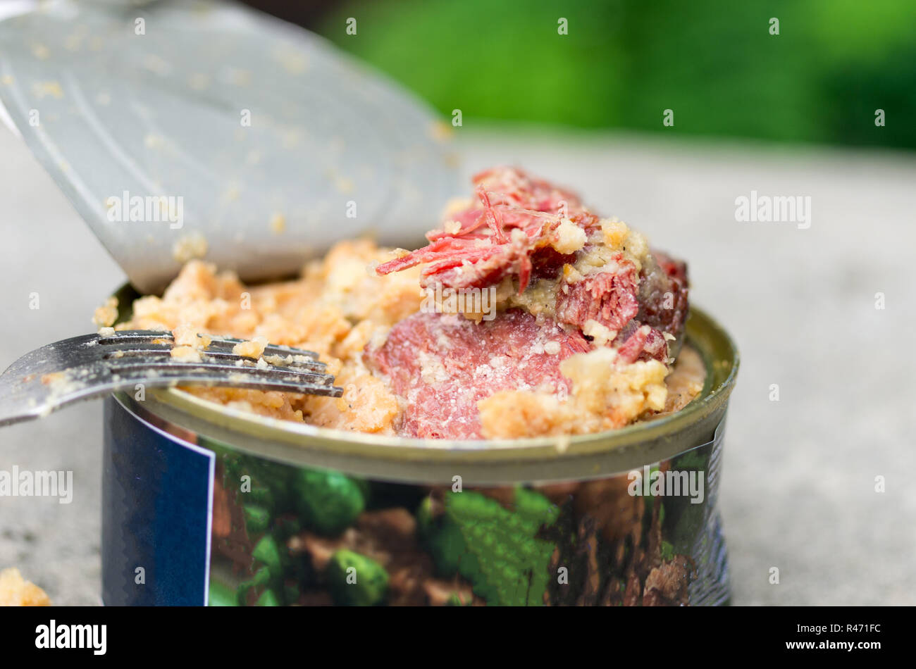 Porridge with meat. Canned food. Pea porridge and meat. Front view ...