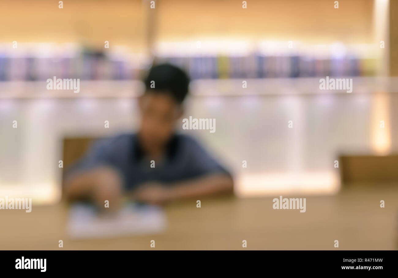 Blur abstract background of public library, read a book Stock Photo - Alamy