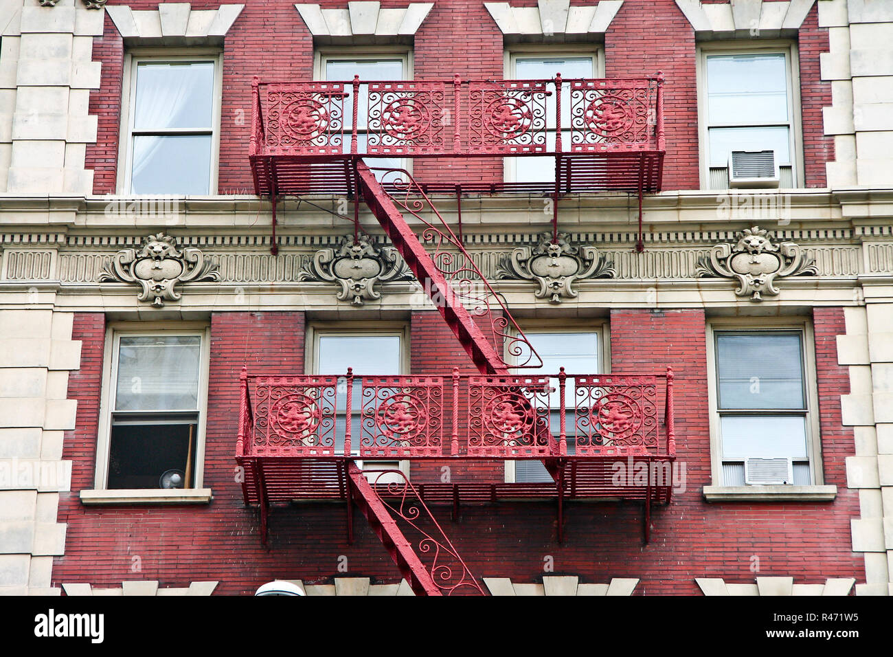 Ornate metal fire escapes hi-res stock photography and images - Alamy