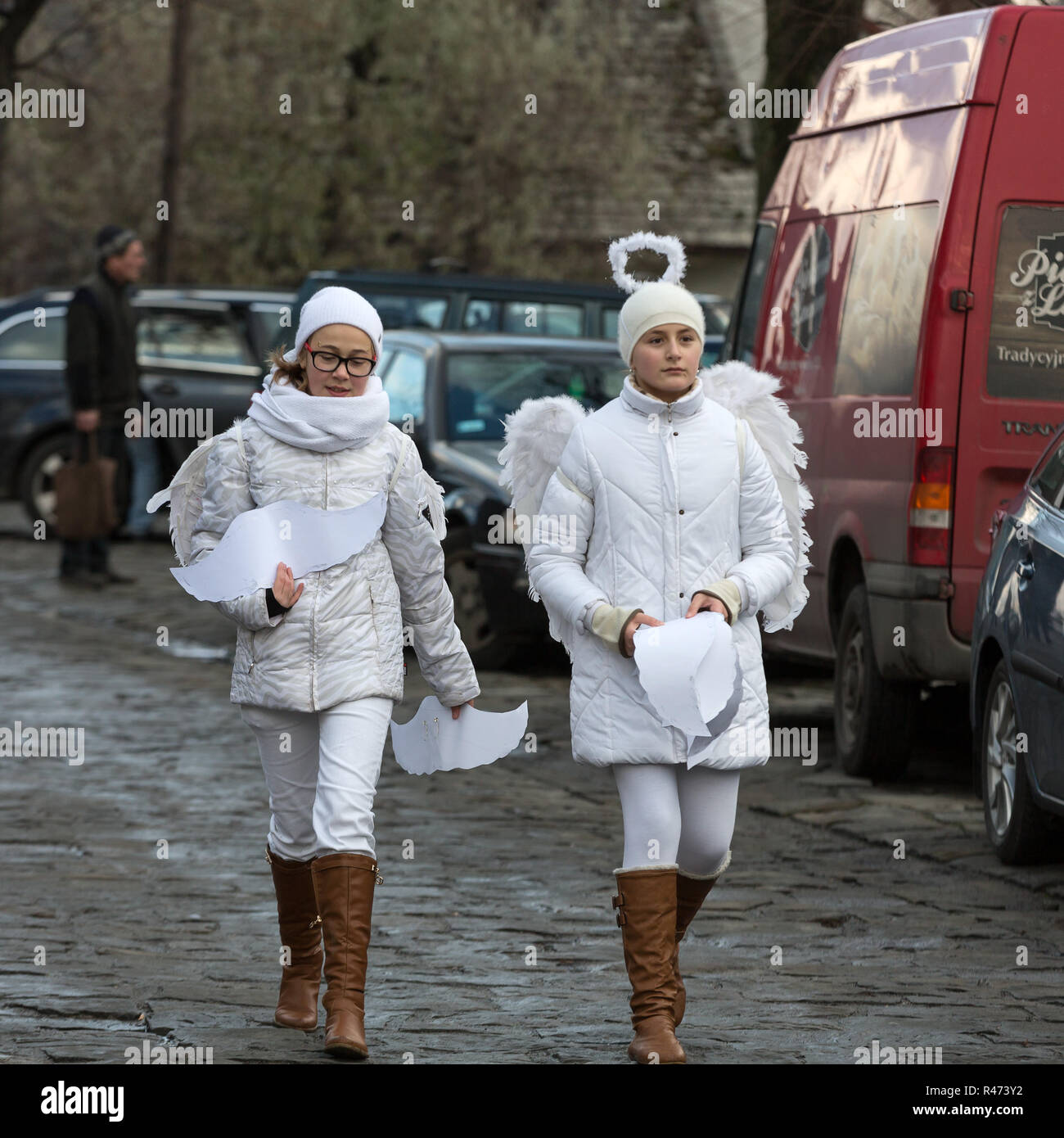 the winter-festival Angel in the country town Stock Photo - Alamy