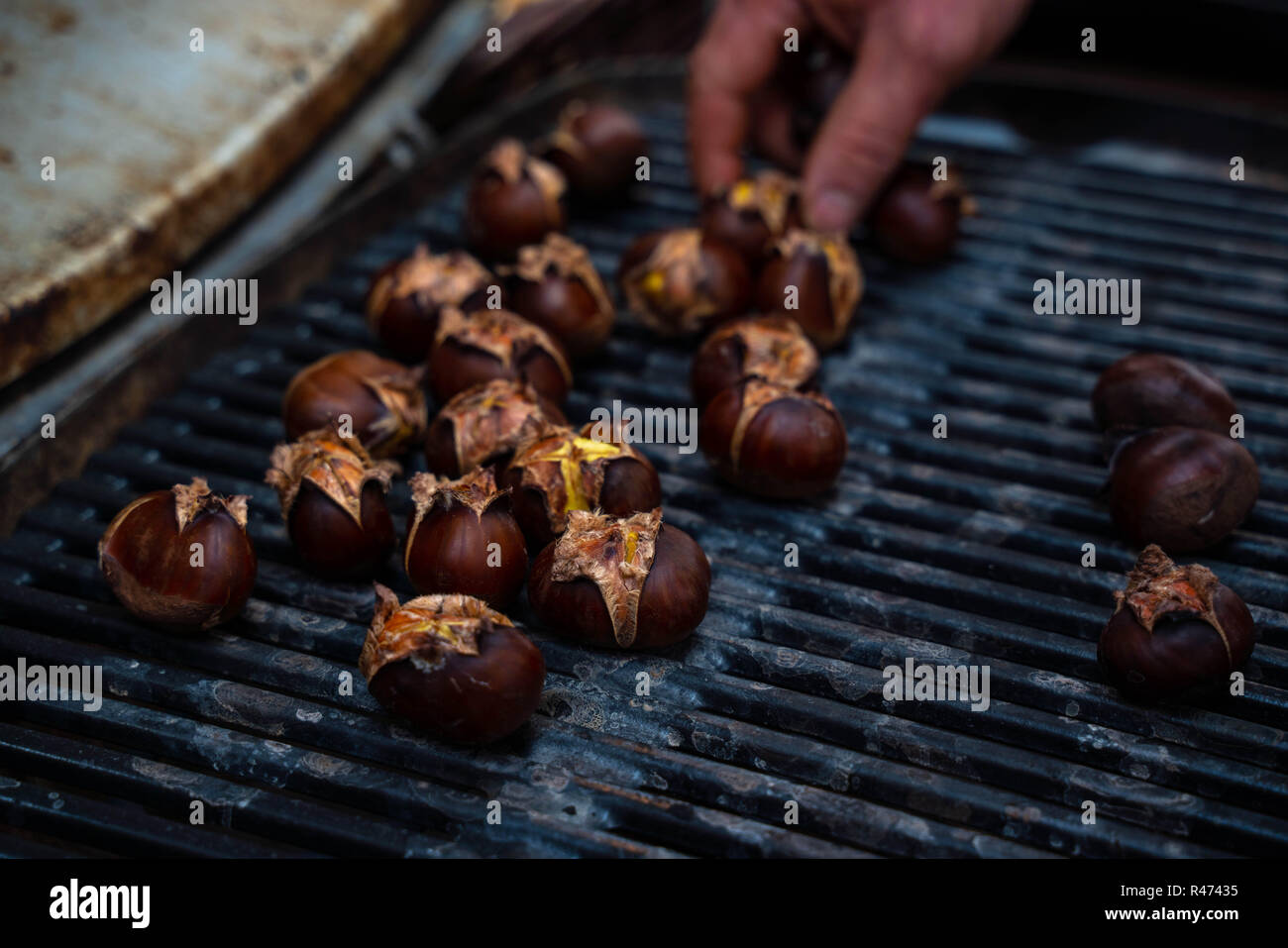 Roasted chestnut vendor hi-res stock photography and images - Alamy