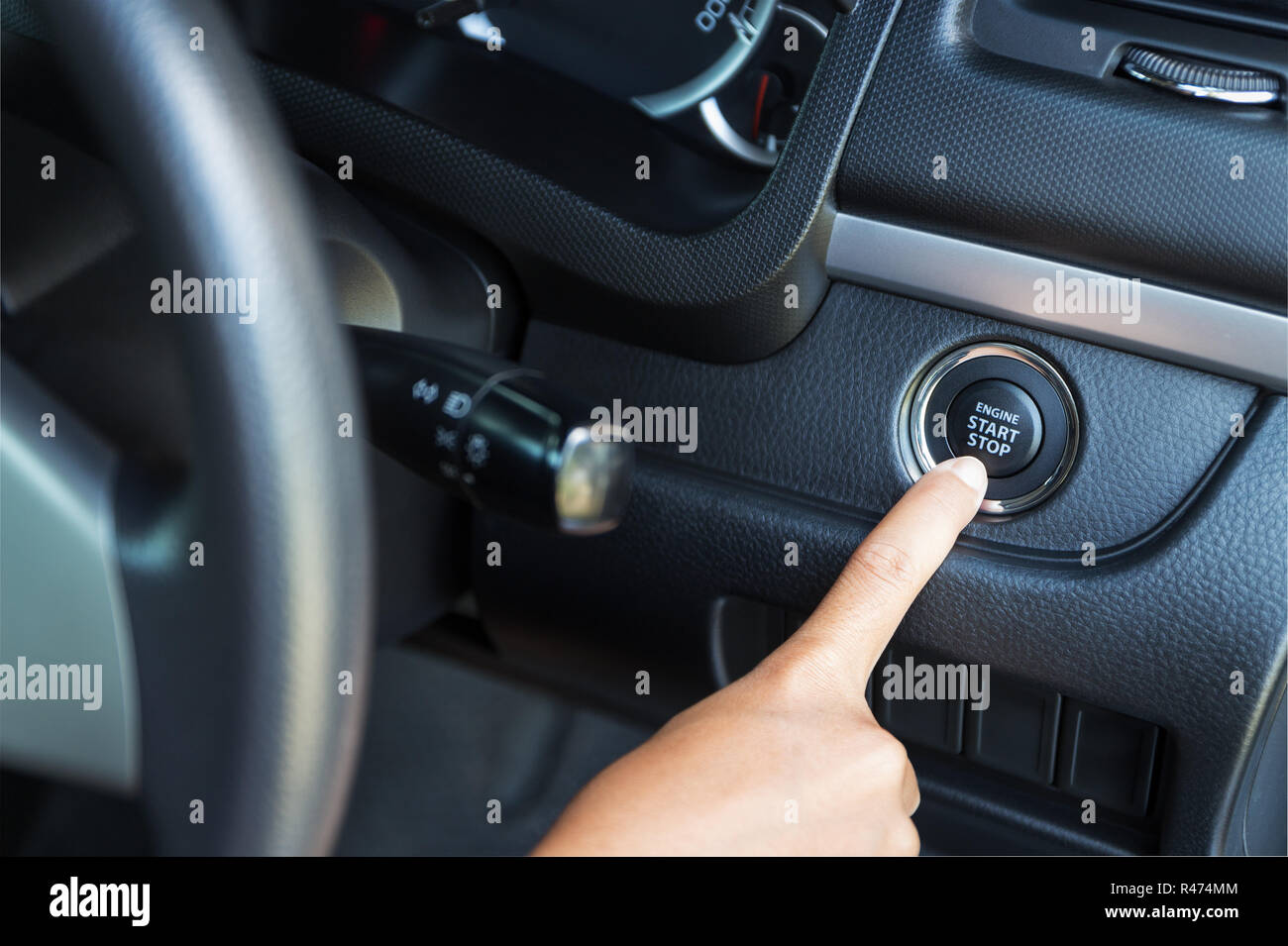closeup hand pushing on car start engine Stock Photo - Alamy