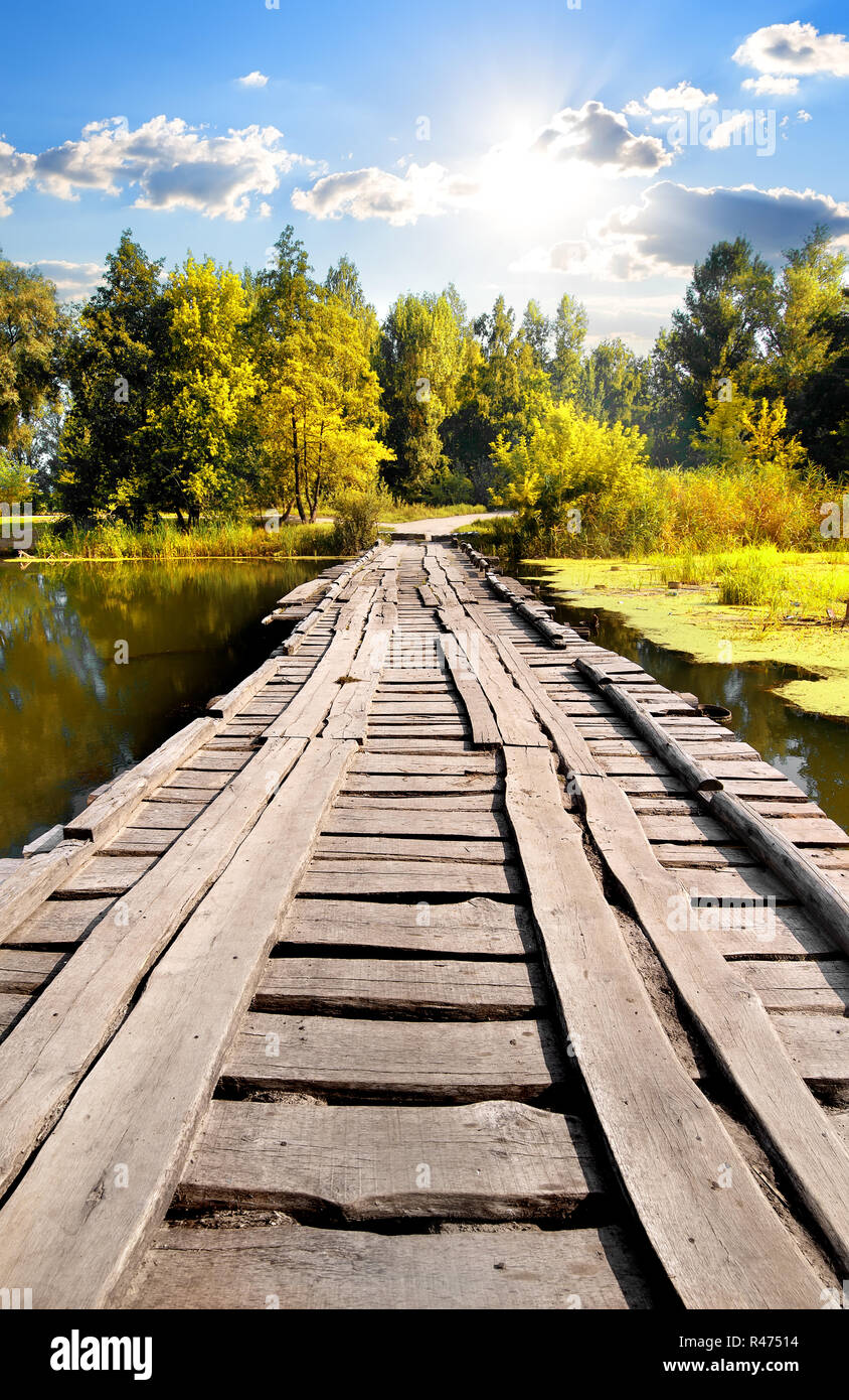 Bridge through river Stock Photo - Alamy