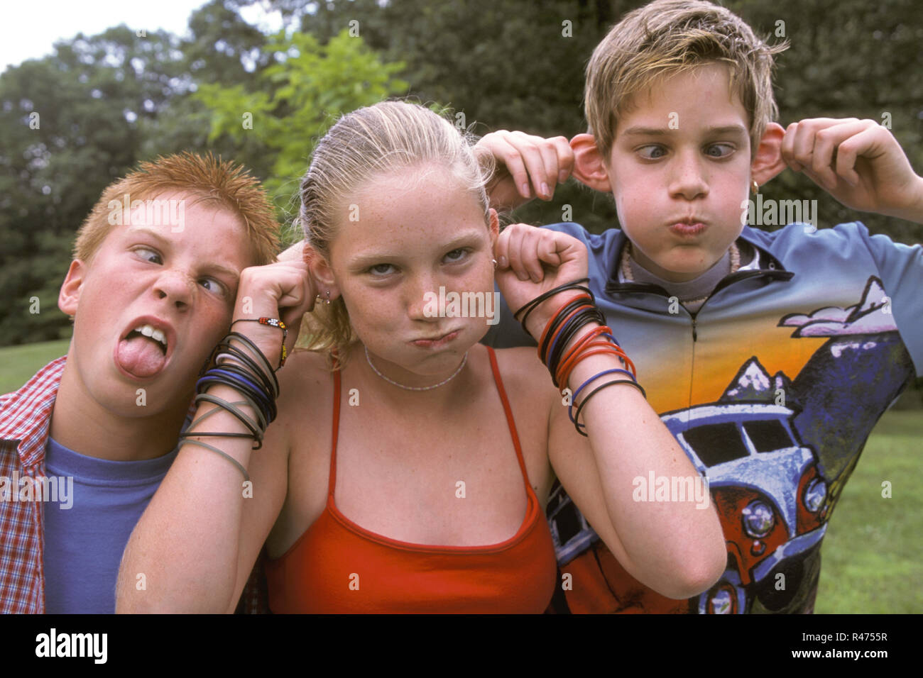 Three Teens Mugging at the Camera, USA Stock Photo - Alamy