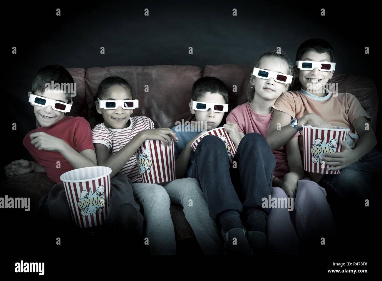 Kids in the movies Stock Photo - Alamy